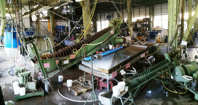 Multi-stage comminution in wet ball mills, coupled with density sorting ...